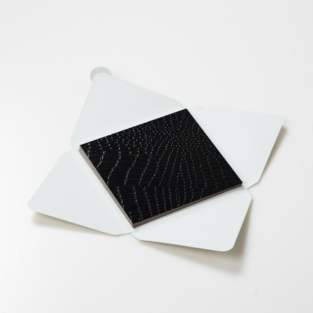 Black colored paper Alligator texture · Manamant Paper Tales